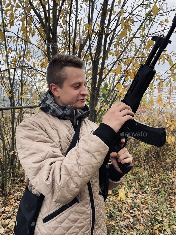 Photo shoot with a machine gun Stock Photo by keshakesha | PhotoDune