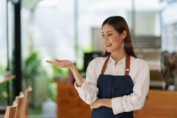 Portrait of Startup successful small business owner in coffee shop. SME ...