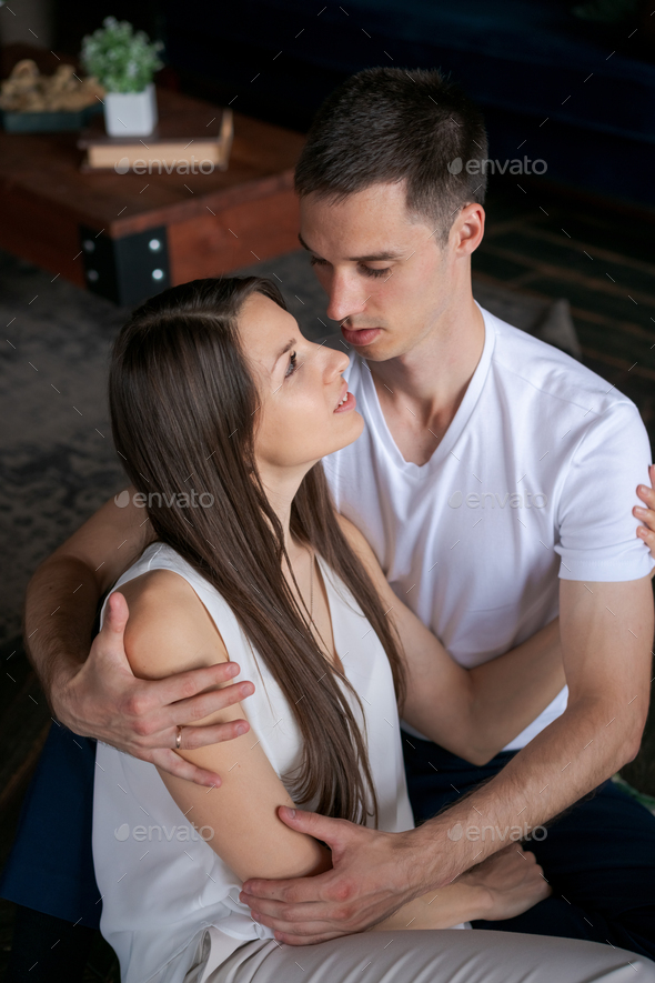 Beautiful happy couple, young husband and wife, romantic affectionate ...