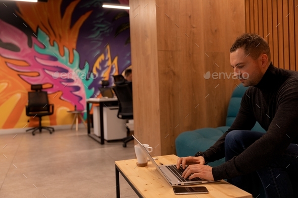 Modern office in open space style, man, programmer makes code Stock ...