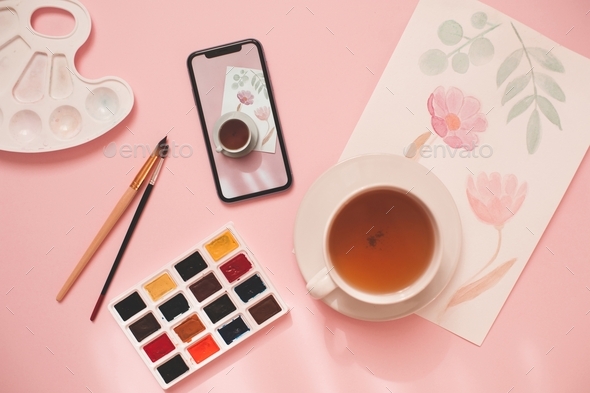 Cup of tea with picture and phone, Paint hobby Stock Photo by morrowlight