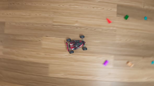 RC car indoor race. Miniature radio-controlled model driving fast in ...