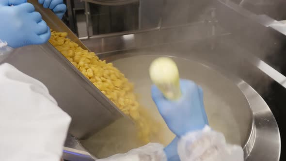 Cooking Pasta at a Ready-Made Food Factory. Workers at the Ready-Made ...