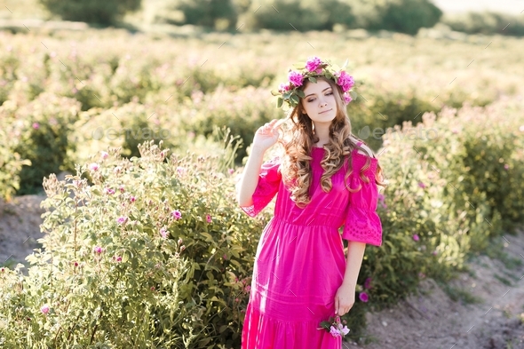 Beautiful blonde teen girl 14-16 year old wearing pink dress holding ...