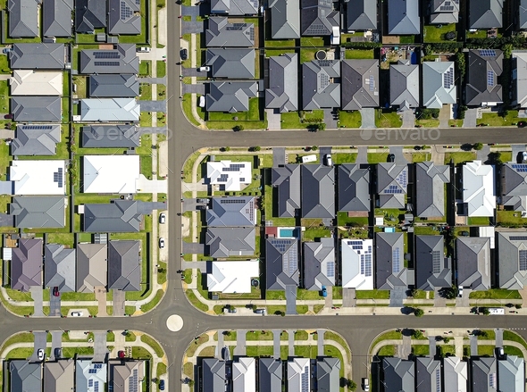 An aerial view of a new housing estate in the suburbs. Urban sprawl ...