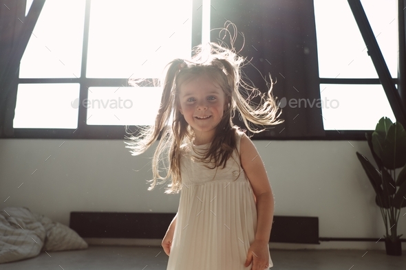 Little girl in sun light portrait Stock Photo by lamapacas | PhotoDune