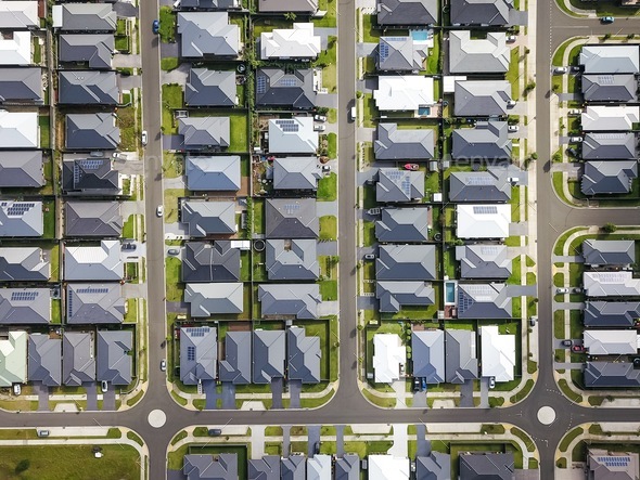 An aerial view of a new housing estate in the suburbs. Urban sprawl ...