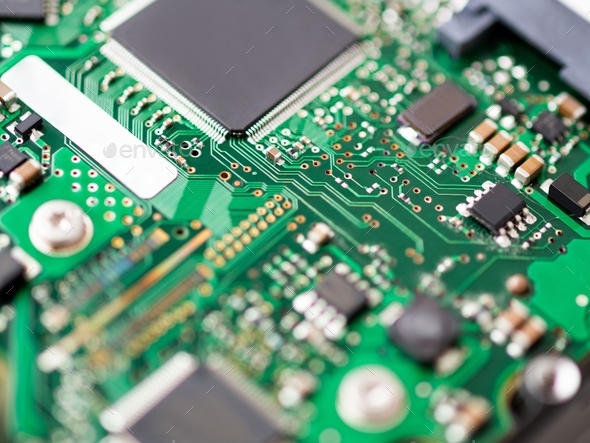 Macro photo of hard disk controller board. IT detail in computer. Technical background. Stock ...
