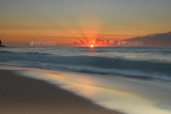 Beautiful sunrise and sun rays over the ocean. Stunning nature Stock ...
