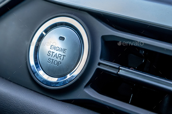 Engine start stop button in modern car close Stock Photo by Yakov_Oskanov