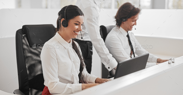 Call center agents using laptops Stock Photo by kegfire | PhotoDune