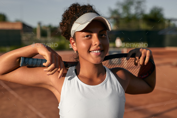 Cheerful black tennis player on court Stock Photo by kegfire | PhotoDune