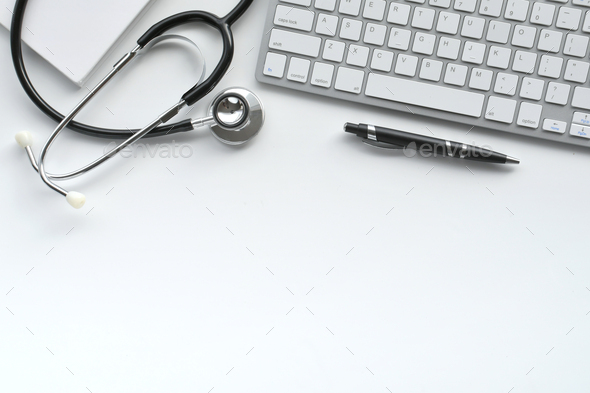 Flat lay of medical personnel doctor desk office with stethoscope ...