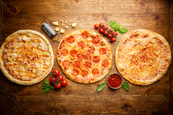 Different tipes of pizza Stock Photo by ipolly80 | PhotoDune