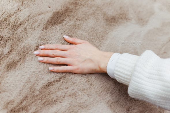 Close up of hand touching soft carpet. Gentle and fluffy carpet between ...