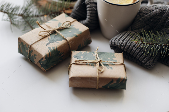 Two wrapping gift boxes on white background. Cozy mood christmas ...