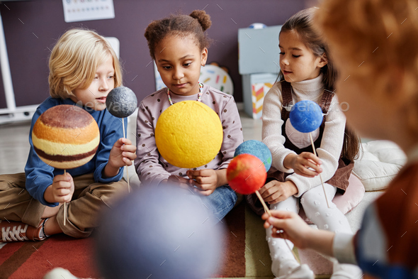Cute little learners of primary school studying astronomy Stock Photo ...
