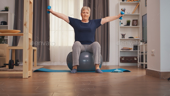 Old woman training shoulders Stock Photo by DC_Studio | PhotoDune