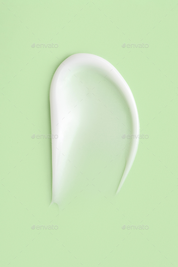 cosmetic smears cream texture on pastel green background Stock Photo by ...