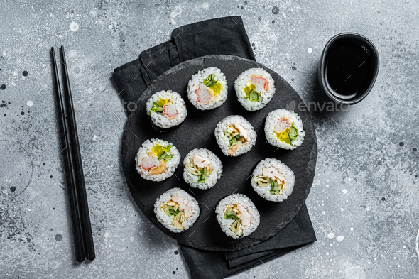 Korean style sushi Kimbap or gimbap made from steamed white rice. Gray ...