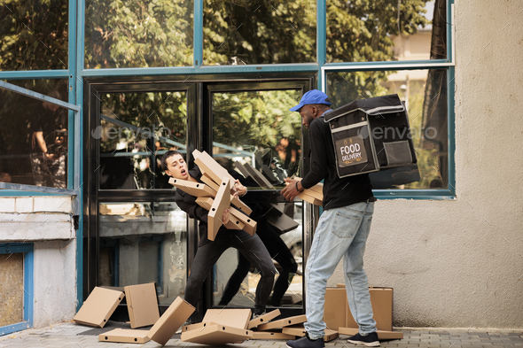 Confused food delivery service customer catching falling pizza boxes ...