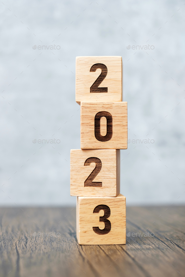 2023 year block on table. Stock Photo by JoPanwatD | PhotoDune