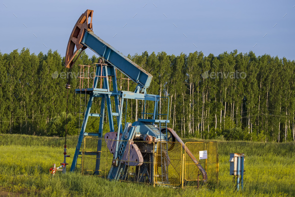 Working oil pump from oil field. Industrial equipment Stock Photo by ...