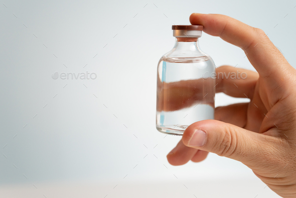 Bottle with solution for injection Stock Photo by Pasanheco | PhotoDune