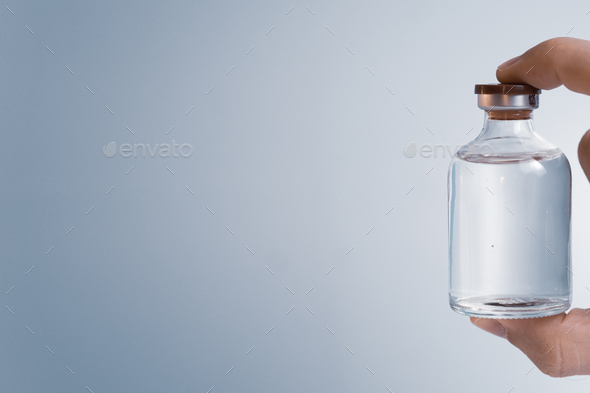 Bottle with solution for injection Stock Photo by Pasanheco | PhotoDune