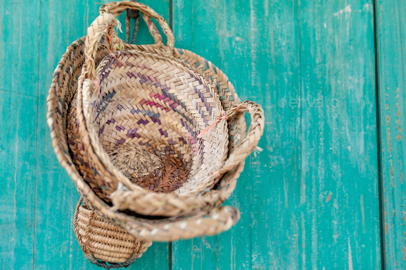 Weaved baskets from dried palm leaves, traditional Emirati handicraft ...