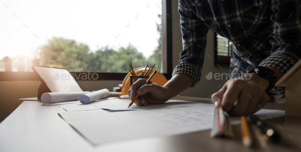 Concept architects, engineer holding pen pointing equipment architects ...