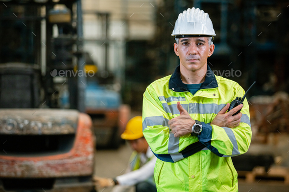 Man professional engineering arms crossed worker wear uniform and hard ...