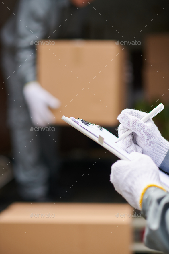 Mover Filling Data in Document Stock Photo by DragonImages | PhotoDune