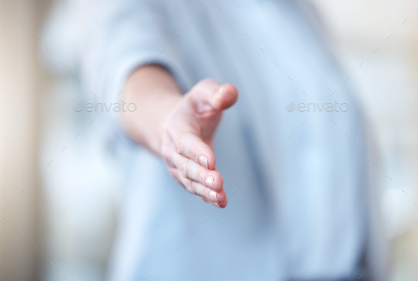 Shot of an unrecognisable businesswoman reaching out to shake hands in ...
