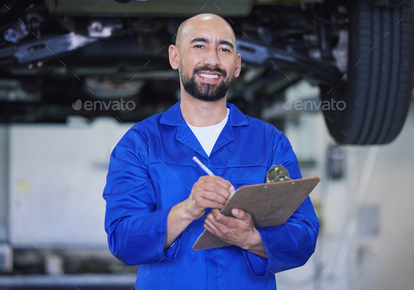 Cropped portrait of a handsome young male mechanic working on the ...