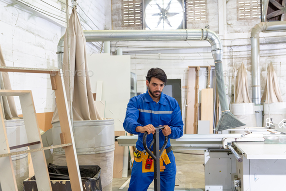 Carpenters Assembling Furniture Business. Young man in production of ...