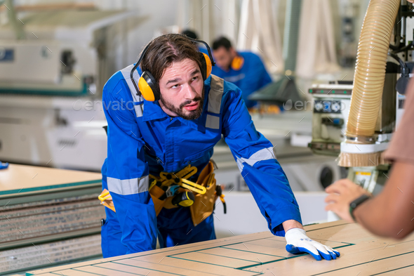 Carpenters Assembling Furniture Business. Young man in production of ...