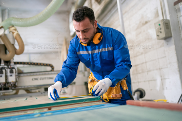 Carpenters Assembling Furniture Business. Young man in production of ...