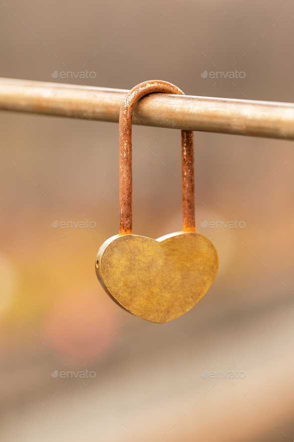 Heart shaped love lock on bridge. Padlock as symbol of love and ...