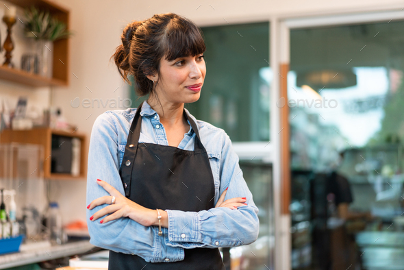 Female barista welcome greeting customer at the coffee bar Stock Photo ...