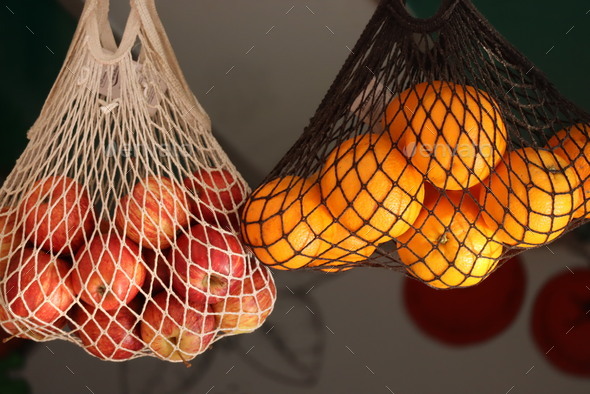 Fruit in nets Stock Photo by Dobbidodarr | PhotoDune