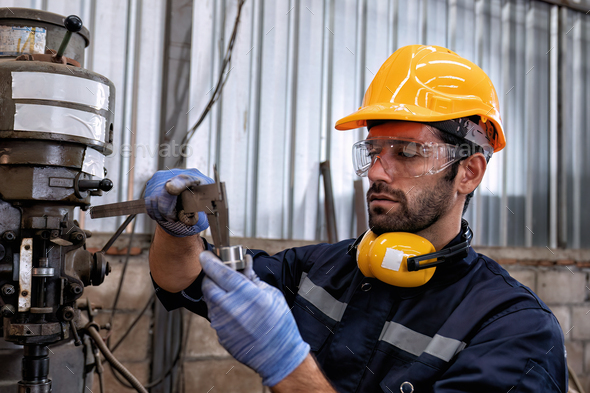 In robotic maintenance repair engineer lathe machine fabricate part and ...