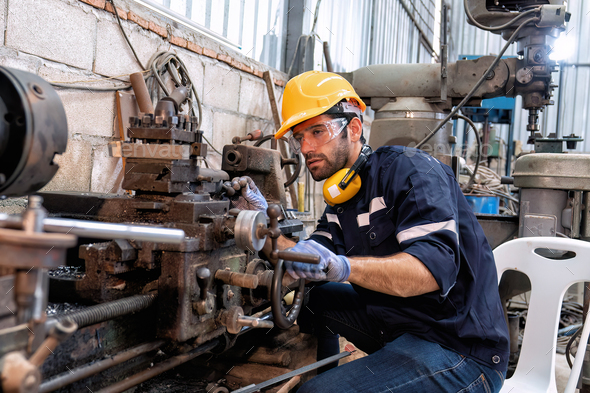 In robotic maintenance repair engineer lathe machine fabricate part and ...