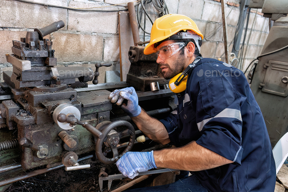 In robotic maintenance repair engineer lathe machine fabricate part and ...