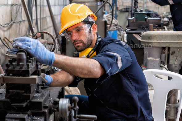 In robotic maintenance repair engineer lathe machine fabricate part and ...