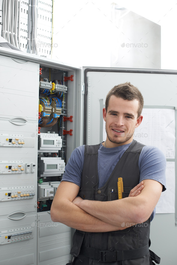 Electrical work poses no problem for him Stock Photo by ...