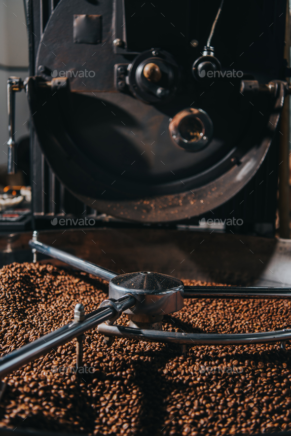Roasting coffee beans in large professional coffee roaster Stock Photo ...