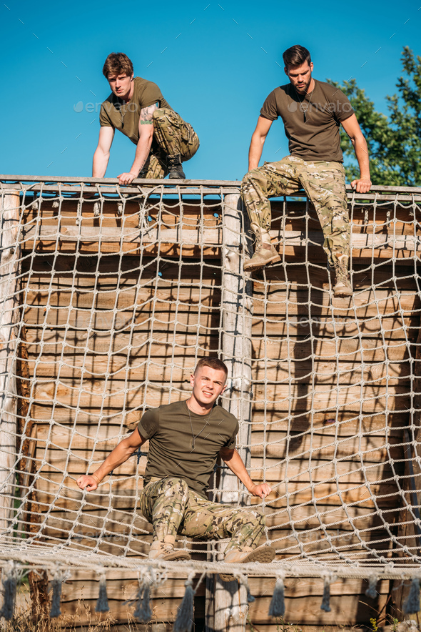 young soldiers practicing during obstacle run on range Stock Photo by ...