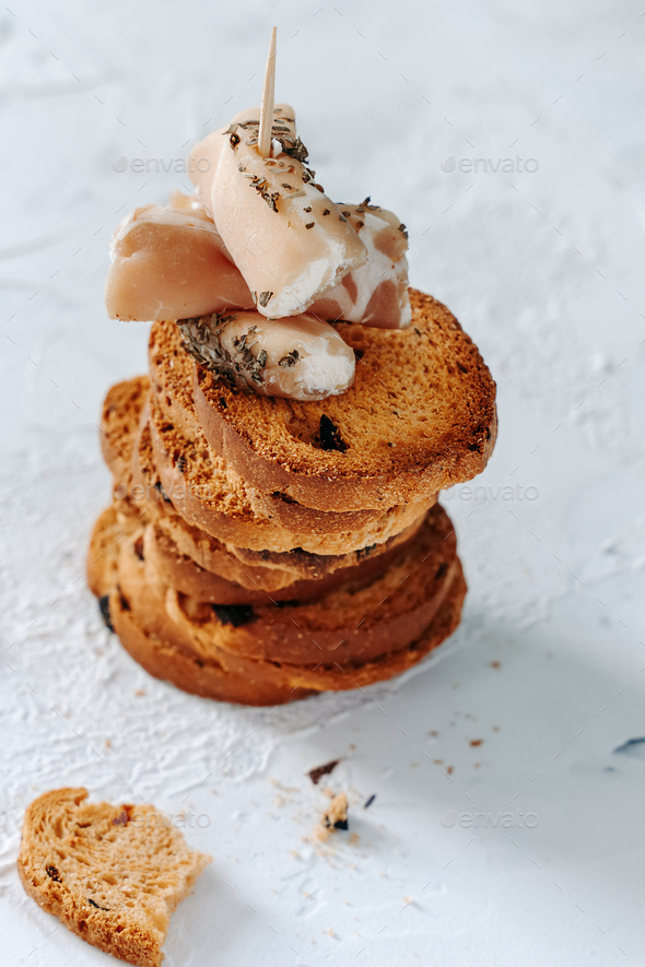 tower of crispy toast with olives, ham and cream cheese canapes. Crispy ...