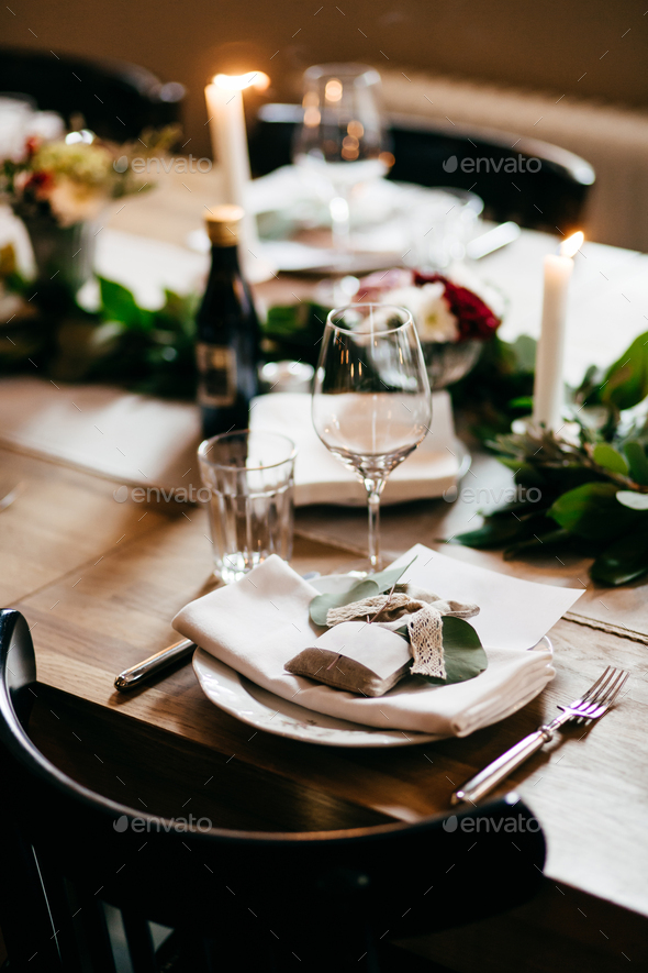Elegant dinner table served for special occasion. Table served with ...